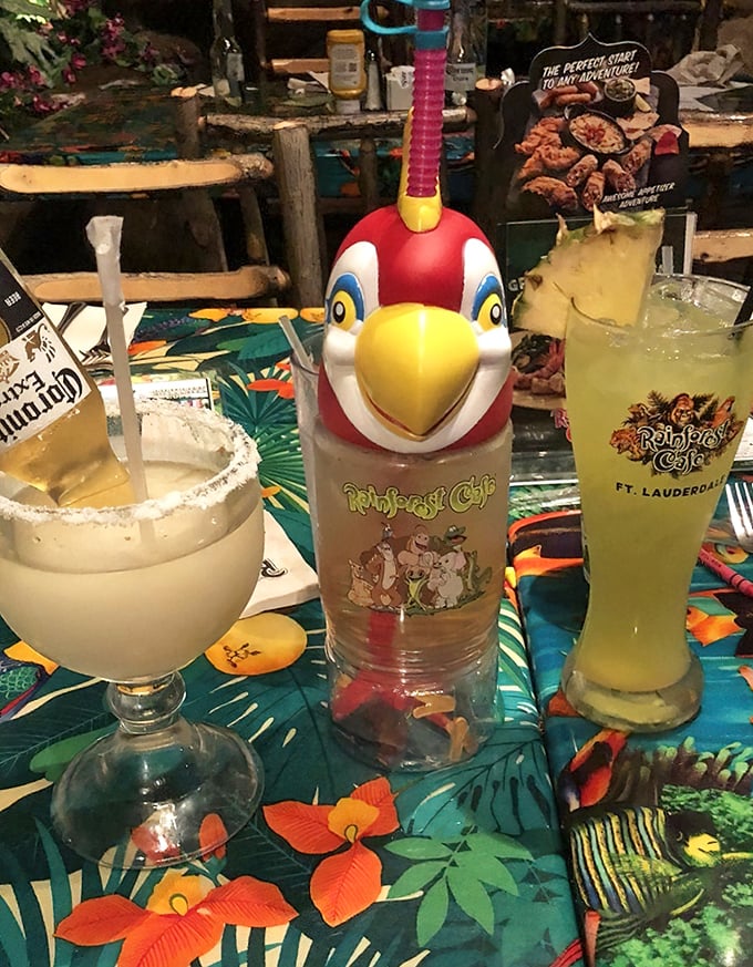 Specialty drinks arrive in vessels that would make Carmen Miranda's hat look understated—complete with plastic wildlife supervision.