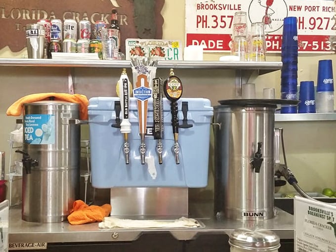The drink station—where sweet tea flows like liquid sunshine and local craft beers stand ready for the lunch crowd.
