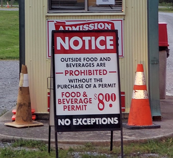 The outside food permit sign—the drive-in's version of "no outside food allowed" that somehow feels more reasonable when you're sitting in your own car.