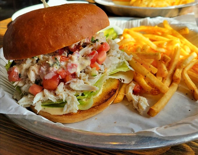 The legendary Dungeness crab sandwich—a monument to the idea that sometimes, the simplest preparation lets great ingredients sing their own delicious song.