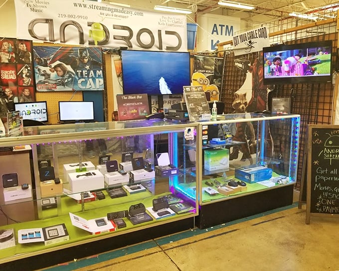 The electronics booth—where yesterday's cutting-edge technology finds tomorrow's enthusiastic new owner at yesterday's prices.