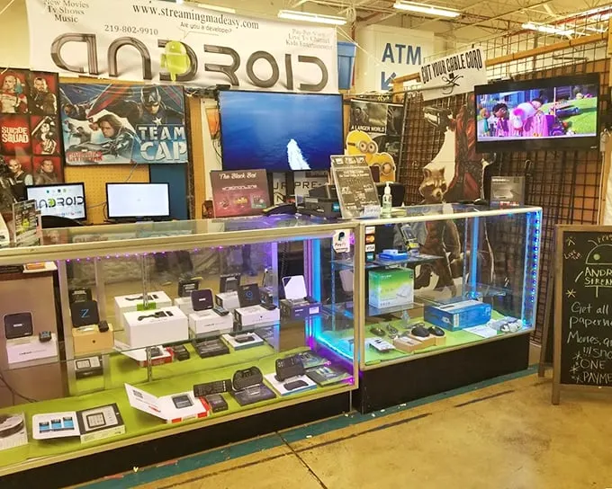 The electronics booth—where yesterday's cutting-edge technology finds tomorrow's enthusiastic new owner at yesterday's prices.