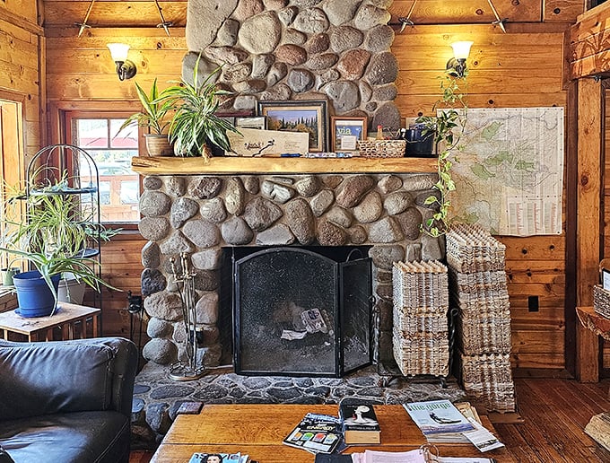 Another view of the magnificent stone hearth – where winter meals taste better as flames dance and snow falls silently beyond the windows.