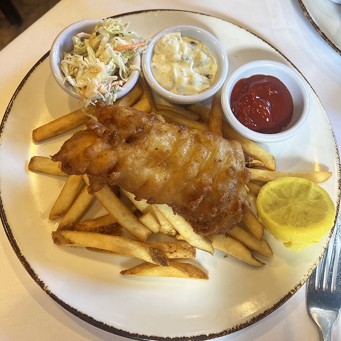 Fish and chips that would make a British pub jealous—golden batter, flaky white fish, and fries that deserve their own fan mail.