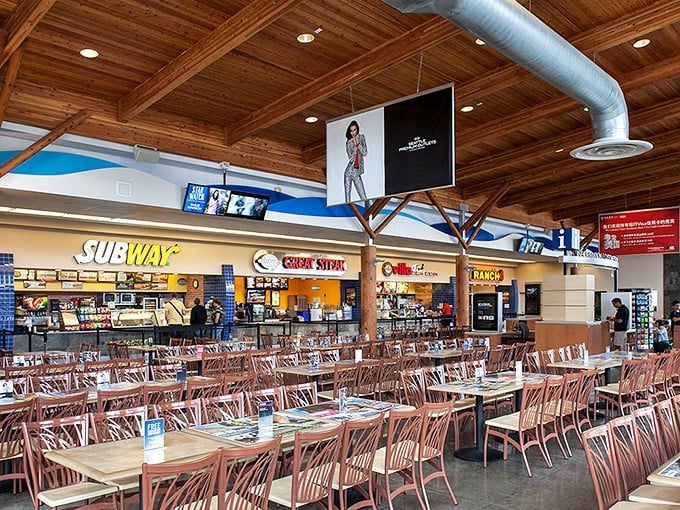 The food court offers a welcome respite for weary bargain hunters—where shopping stamina is restored before the next retail round.