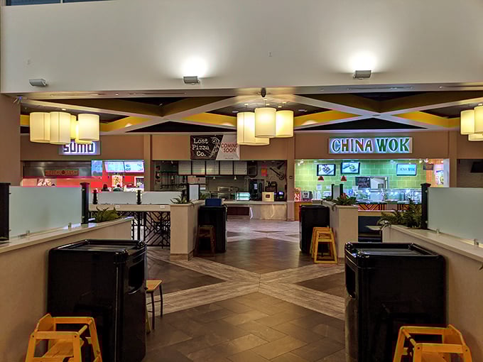 The food court—where international cuisines converge to refuel shoppers debating between the blue shirt or the slightly different blue shirt.