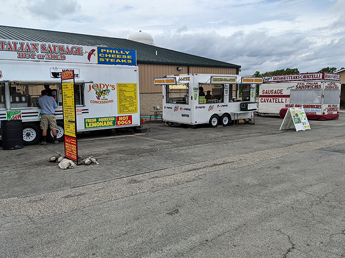 The food truck court – where Italian sausage meets Philly cheesesteak in a delicious cultural summit.