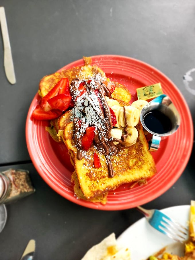 This isn't just French toast—it's a sweet symphony of bread, fruit, and chocolate that makes Monday morning feel like Saturday.