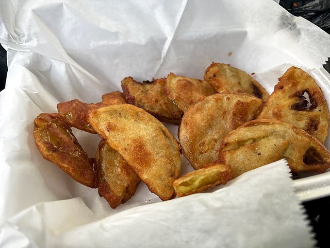 Fried green tomatoes: the South's gift to appetizers. Crispy, tangy, and addictive—these golden discs disappear faster than you can say "y'all want some more?"