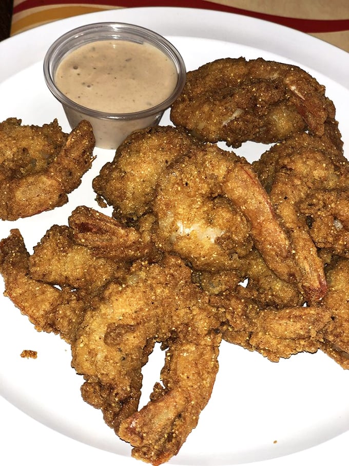 Fried shrimp with a crust so perfect it should win architectural awards. That dipping sauce isn't optional—it's the final brushstroke on a masterpiece.