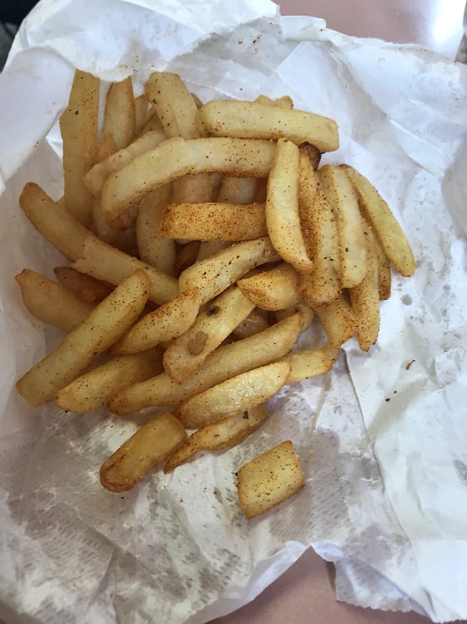 These seasoned fries aren't just a side—they're supporting actors that occasionally steal the scene with their perfect balance of crispy exterior and fluffy interior.