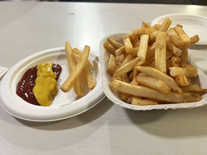 Fries that understand their supporting role—crispy, golden, and ready for a dip in ketchup, mustard, or both if you're feeling adventurous.