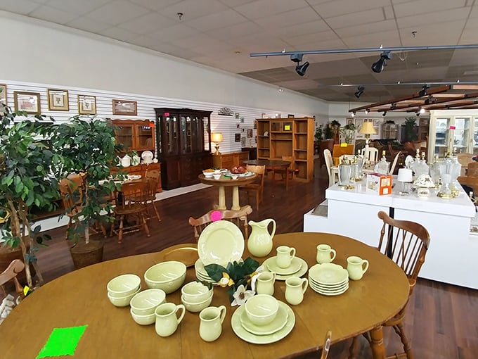 Dining sets staged with the care of a home magazine spread. That yellow dinnerware is having its retro moment again!