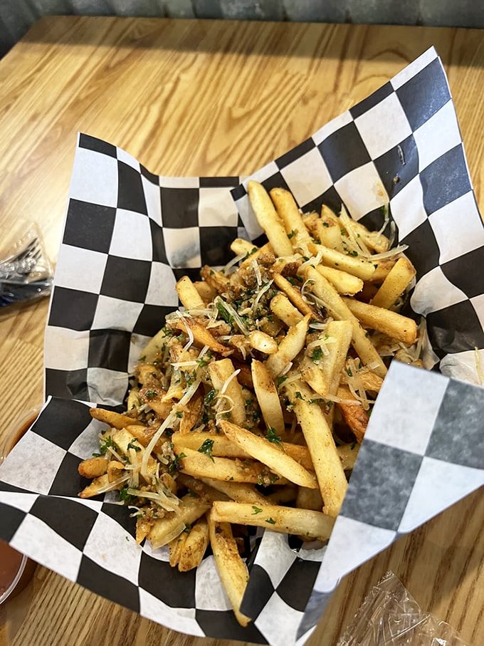 Fries that refused to settle for mediocrity. Dressed up with herbs, cheese, and seasoning, these spuds clearly went to finishing school.