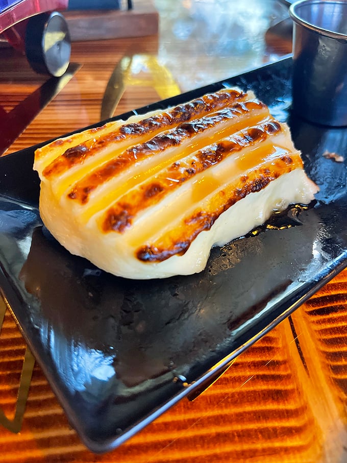 This isn't just cheese—it's a masterclass in the art of grilling dairy. Those char marks deserve their own appreciation society.