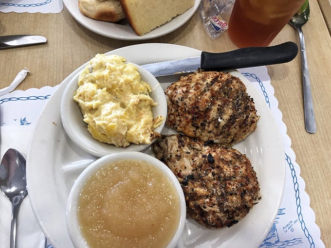 Grilled chicken with potato salad and applesauce—comfort food that reminds you of Sunday dinners at grandma's, but somehow even better.