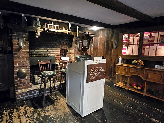 The gateway to gustatory delight—where modern hospitality meets colonial charm at the hostess stand that's witnessed countless eager arrivals.
