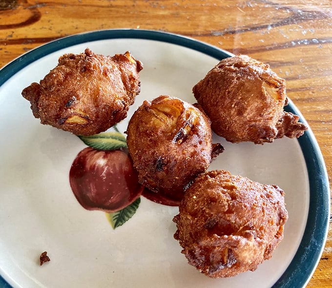 Golden-fried hush puppies that crunch then yield to a tender interior – the perfect handheld breakfast appetizer you never knew you needed.