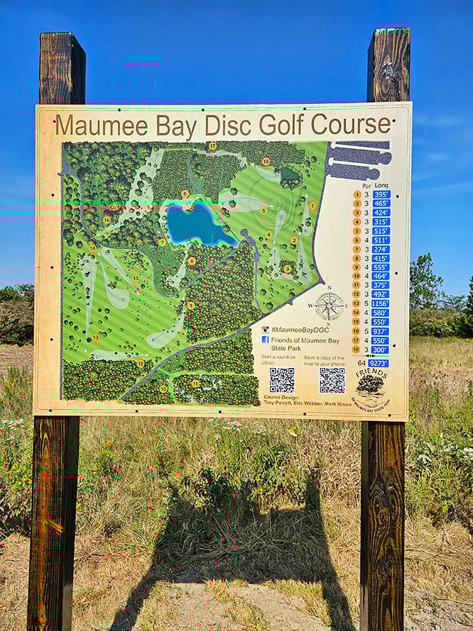 The disc golf course map reveals a challenging layout that winds through forests and around water features.
