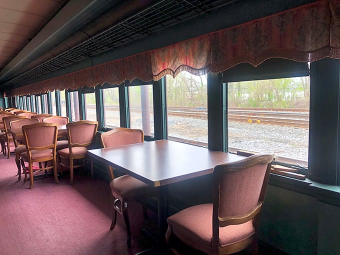 Dining with a view—actual railroad tracks visible through the windows remind you this isn't just themed décor; it's an authentic slice of Pennsylvania history.