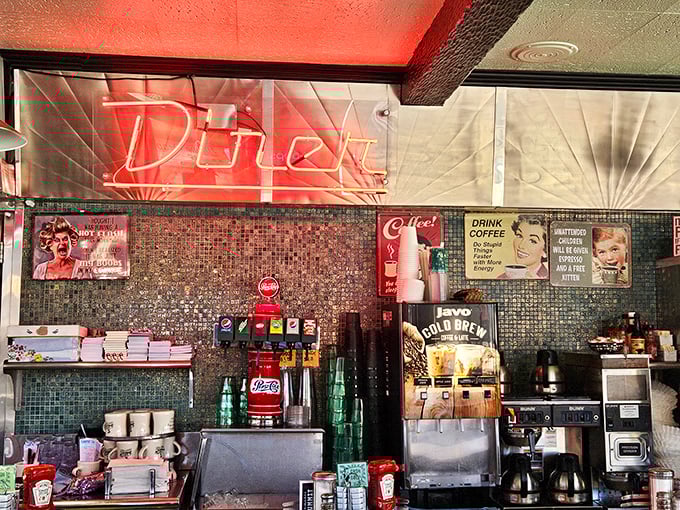Vintage decor that doesn't come from a catalog—these walls have absorbed decades of coffee steam, conversation, and community.