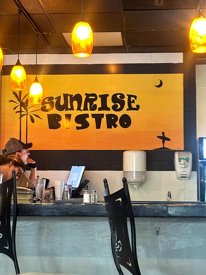 The wall art proudly declares "BISTRO" and "COFFEE BAR"—two of the most beautiful phrases in the English language, especially before 10 AM.