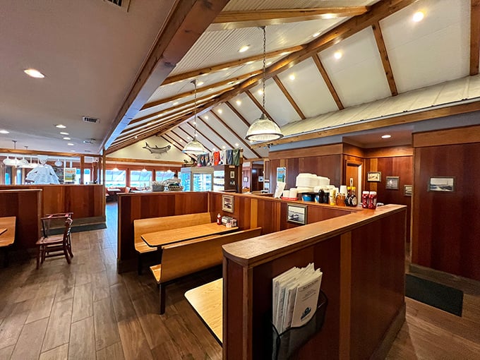 Wooden booths worn smooth by decades of happy diners. The vaulted ceiling gives your breakfast experience the reverence it deserves.