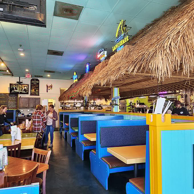 Tiki hut vibes and bright blue booths create an atmosphere that says "yes, you're still in North Charleston, but your taste buds are on vacation."