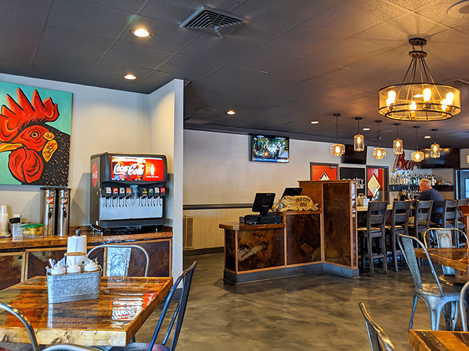 Colorful artwork and rustic-industrial fixtures create an atmosphere that's both hip and homey—like your coolest friend's dining room.