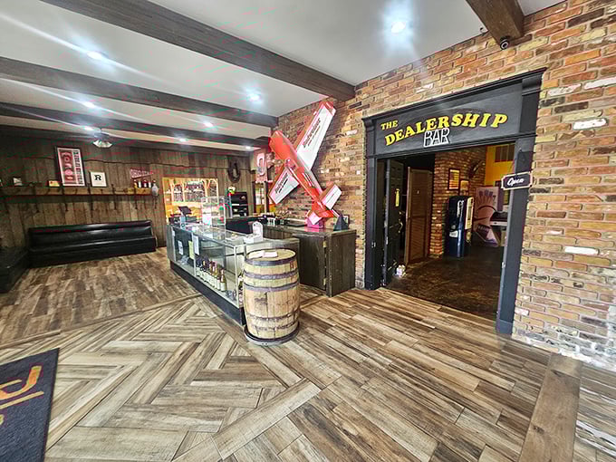 The Dealership Bar entrance beckons with rustic charm—proof that the best small-town restaurants always have unexpected surprises around every corner.