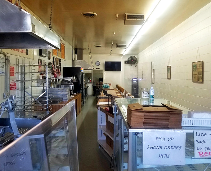 The narrow galley layout isn't by accident—it's to ensure you pass by every tempting option before making your impossible choice.