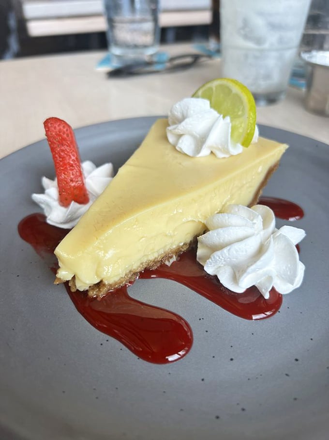 Key lime pie that strikes the perfect balance between sweet and tart—like that friend who tells you the truth but makes you laugh while doing it.