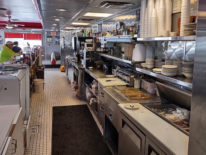 The kitchen – where the magic happens at lightning speed, as skilled cooks transform simple ingredients into the comfort food that keeps us coming back for more.