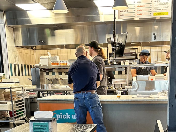 The pass – that sacred space where chefs transform ingredients into memories. Where every plate gets a final inspection before meeting its destiny.