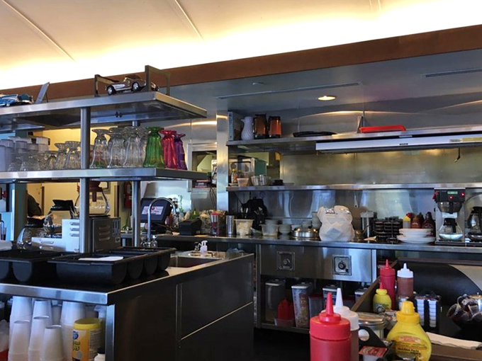 The kitchen—where breakfast magic happens with military precision and zero pretension. No foam or "essence" of anything here.
