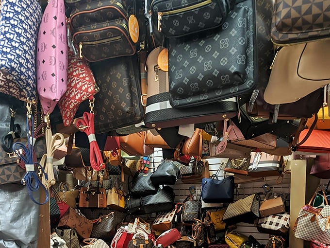 Designer-inspired handbags hanging like exotic fruit – pick one and instantly transform your outfit without transforming your bank account.