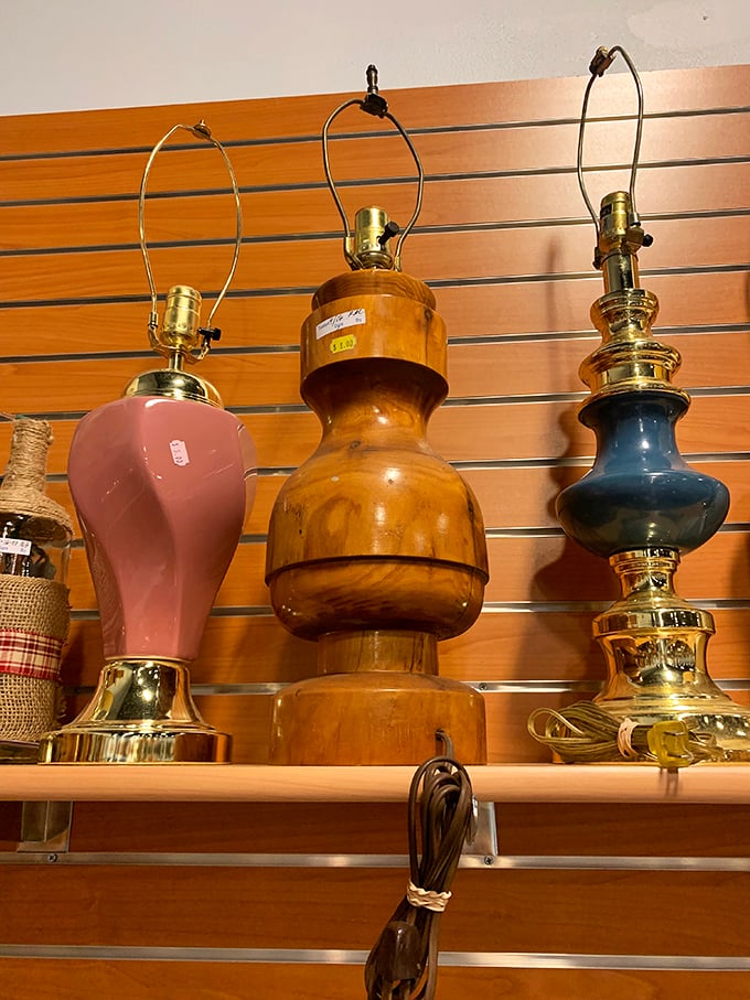 Lamp trio that spans decades of design sensibilities – from "grandmother's favorite" to "1970s wood-turned masterpiece" in one display.