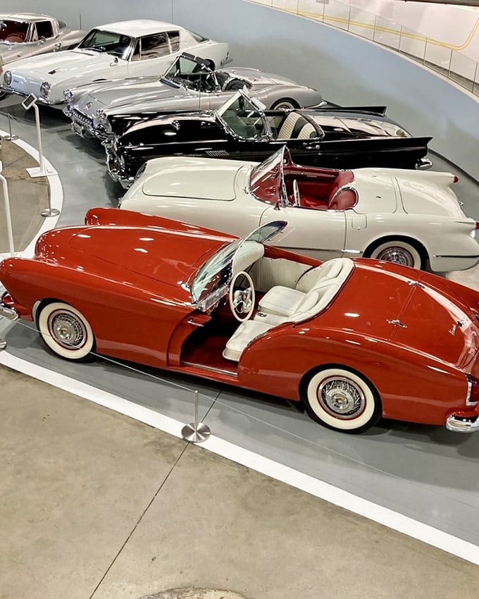 A rainbow of convertibles showcases America's optimistic postwar palette—each open-top beauty promising wind-in-your-hair freedom and endless summer adventures.