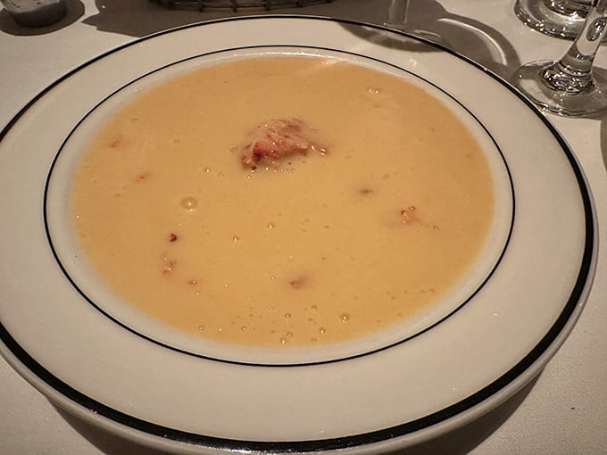 This lobster bisque isn't just soup—it's a warm hug in a bowl, with chunks of lobster playing hide and seek beneath the surface.