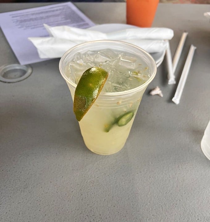 A margarita that's dressed for success with its lime wedge hat. This isn't just a drink—it's liquid sunshine with attitude.