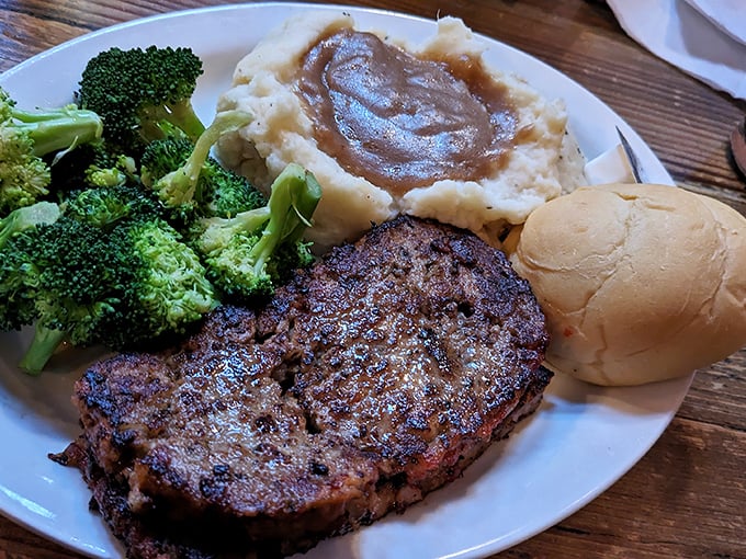 This meatloaf dinner isn't your grandmother's recipe—unless your grandmother was a culinary genius who mastered the perfect savory glaze.