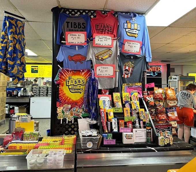 Tibbs merchandise lets you take the drive-in experience home. T-shirts, candy, and souvenirs—proof you've joined the drive-in faithful.