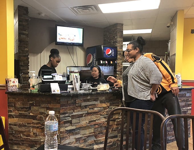 The front lines of flavor—where orders are placed and anticipation builds. The hardest part? Choosing between all those soul-satisfying options.