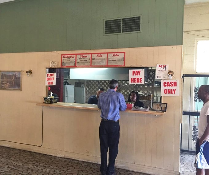 The ordering counter—where dreams begin, decisions are made, and the anticipation of barbecue perfection starts to build.