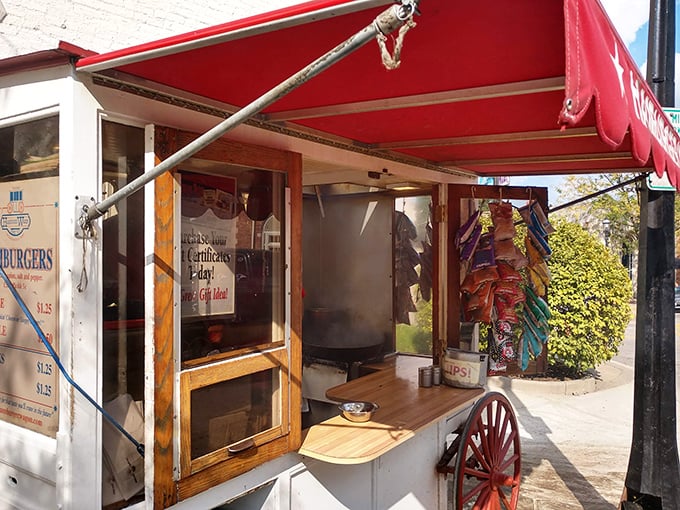 Steam rising, spatula flipping—it's burger theater in the round. The best show in town costs less than a movie ticket.