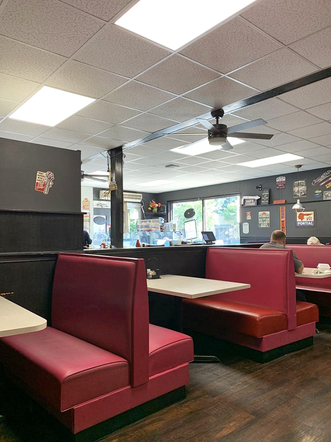 Classic diner booths in fire-engine red invite you to slide in and stay awhile. Calories don't count in booths this comfortable. 