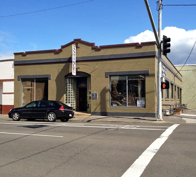 The historic building stands proudly on Astoria's corner—a time capsule disguised as architecture, beckoning curious passersby inside.