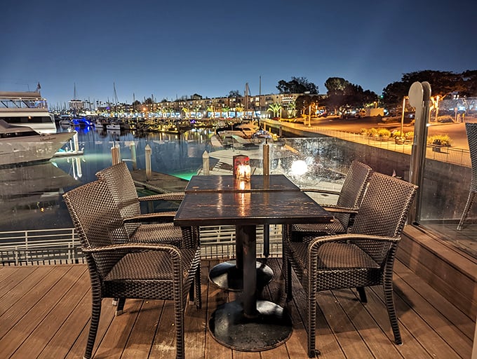 As night falls, the marina transforms into a twinkling wonderland, making outdoor tables the hottest real estate in town—no broker required.