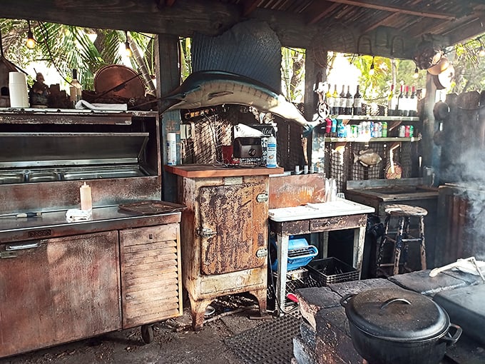 This outdoor kitchen might not look fancy, but it's where seafood magic happens with smoke, fire, and Florida soul.