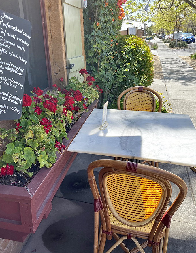 Sidewalk seating framed by blooming geraniums offers that quintessential French experience – people-watching with excellent food and Yountville's perfect weather as companions.